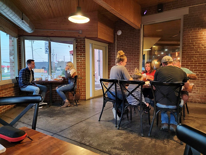 Where memories are made between bites—families and friends gathering in a space that feels both timeless and perfectly of-the-moment.