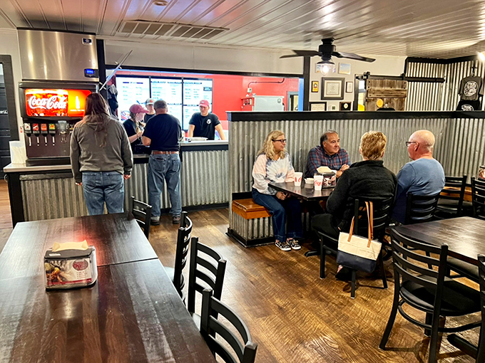The ordering counter&mdash;where dreams are placed and fulfilled&mdash;while fellow pilgrims gather to worship at the altar of smoked meats.