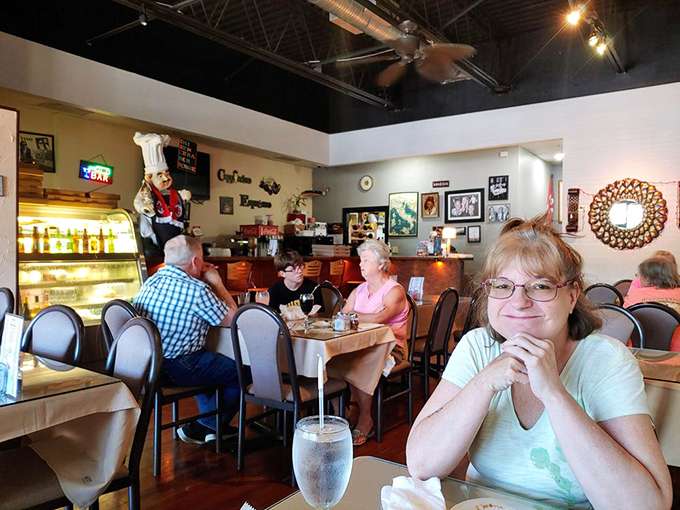 The dining room at Angelo's&mdash;where strangers become neighbors and everyone's united by the universal language of "mmmmm."