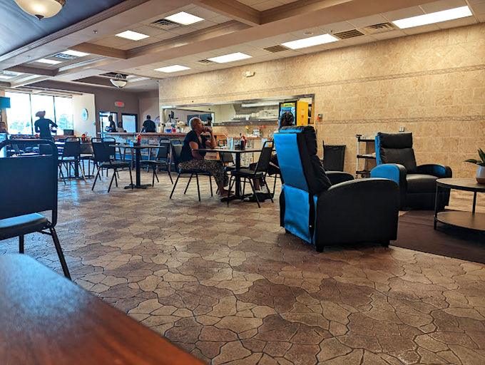 The dining room hums with anticipation and satisfaction. Every table tells a story of hunger transformed into happiness. 