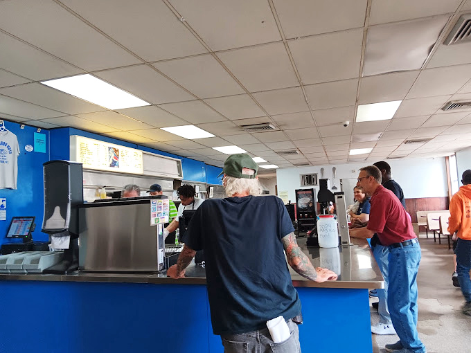 Pilgrims to this temple of tastiness come from all walks of life, united by the universal language of "I'll need extra napkins, please."