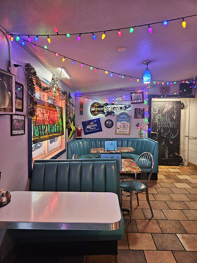The interior glows with colorful string lights and retro booths&mdash;like your favorite beach bar somehow teleported to the Midwest.