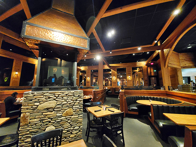 The dining room balances rustic charm with modern comfort, like your favorite flannel shirt that somehow became acceptable to wear to dinner.