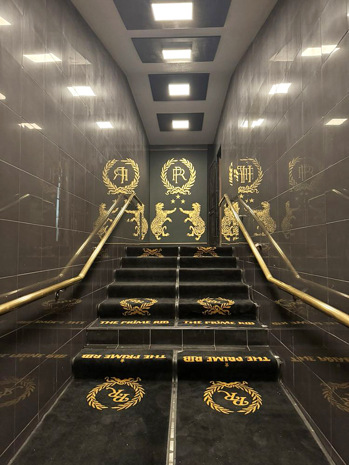 The entrance stairway announces your arrival in style. Those gold accents aren't just decoration&mdash;they're a promise of the gilded experience ahead.