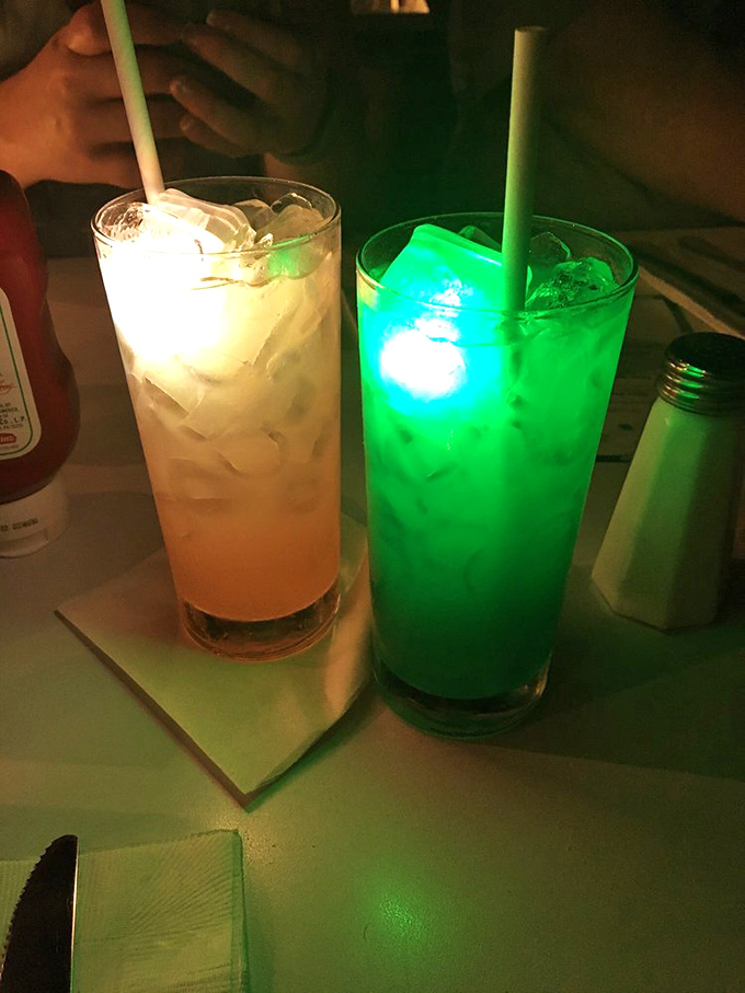 One drink glows like nuclear material from a 1950s sci-fi flick&mdash;proof that even the beverages here are ready for their cinematic moment.