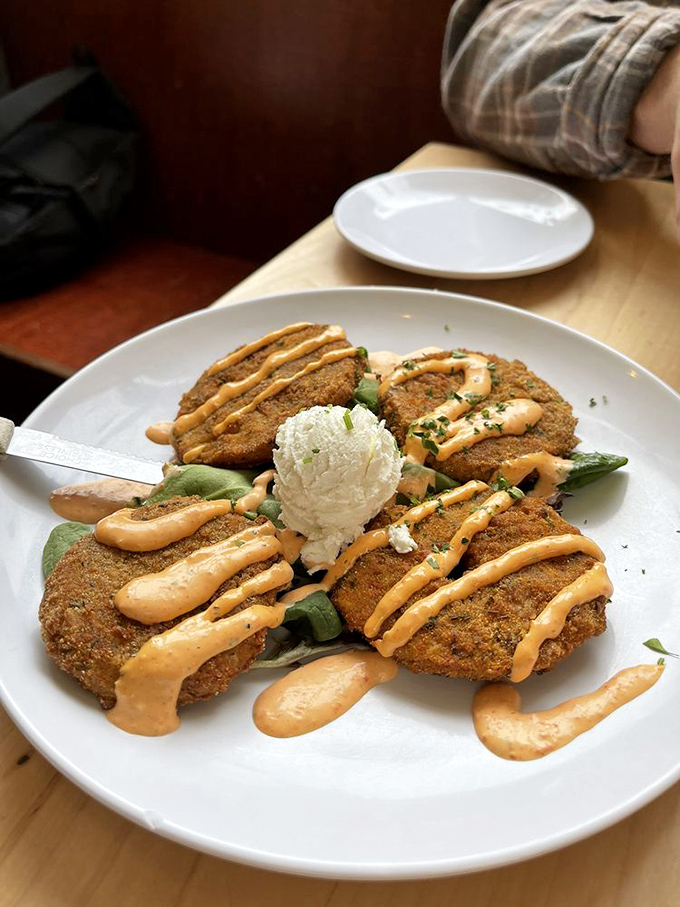 Fried green tomatoes with a sauce that makes you want to lick the plate. Go ahead, we won't judge.