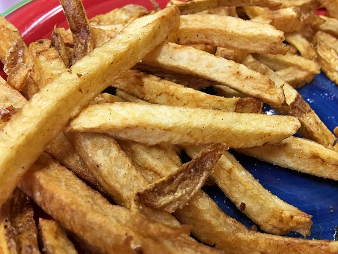 Fries that achieve the golden ratio of crispy exterior to fluffy interior. Not just a side dish&mdash;these are main event contenders that demand your full attention.