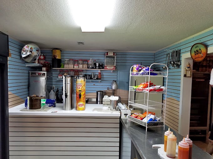 Behind the scenes where barbecue magic happens&mdash;squeeze bottles standing at attention like soldiers ready to deploy flavor at a moment's notice.