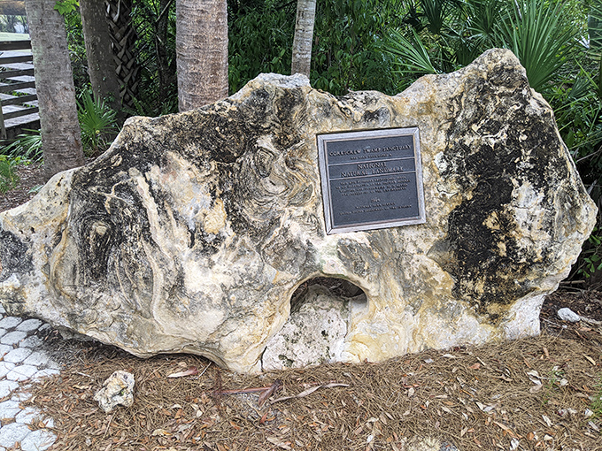 This weathered marker tells tales of conservation victories, reminding us that this paradise exists only through human foresight.