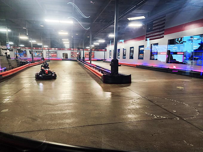 Inside the racing arena, karts await their next drivers while staff prepare for another round of "who can pretend they're not terrified of the teenager who's lapping everyone."
