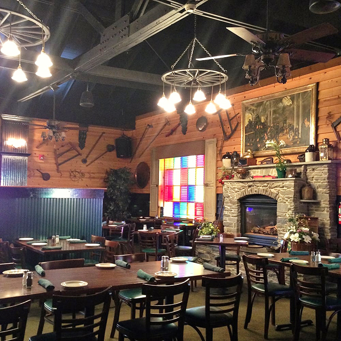 The bar area glows with amber bottles and warm wood. It's the kind of place where strangers become friends over perfectly poured pints. 