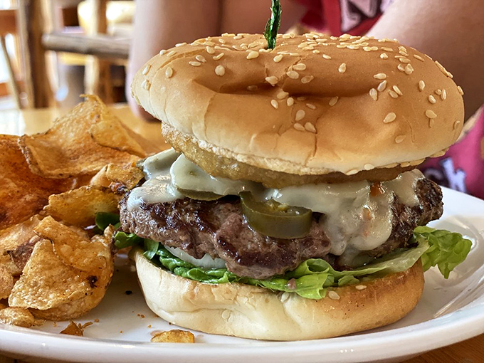 A burger that requires both hands and a strategy&mdash;juicy, cheese-draped perfection that makes vegans question their life choices.