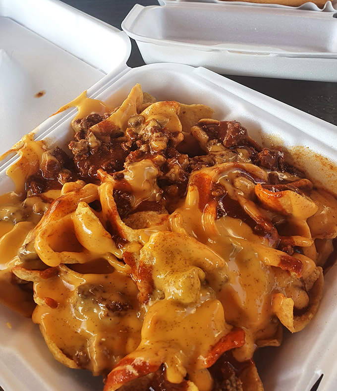 These aren't just nachos—they're a geological wonder of layers, where cheese flows like lava over seasoned beef terrain.