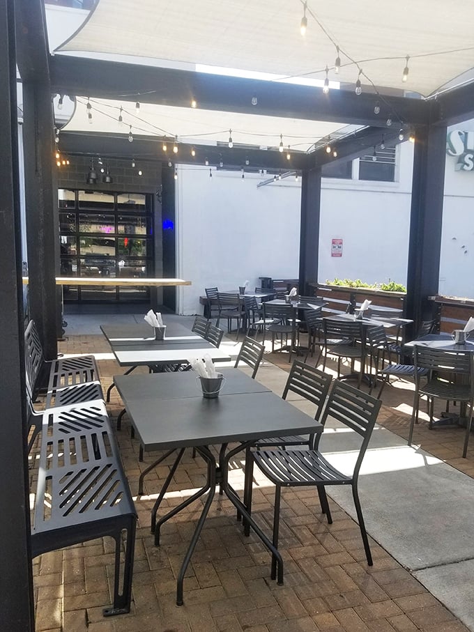 Outdoor dining that feels like an urban oasis. Those string lights aren't just decorative&mdash;they're setting the stage for memory-making meals.