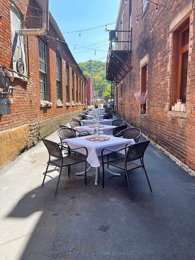 Alleyway dining that transforms "eating between buildings" into romantic European ambiance. String lights make everything magical, even in small-town Indiana.