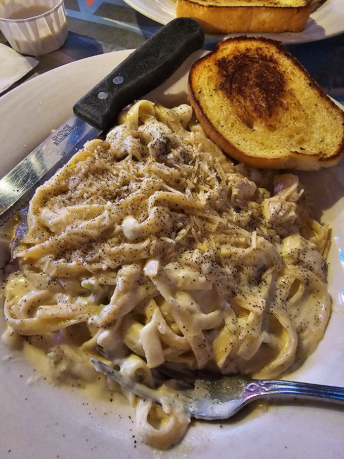 Pasta that doesn't need a passport to transport you. Creamy, carb-loaded comfort that demands to be twirled and savored.