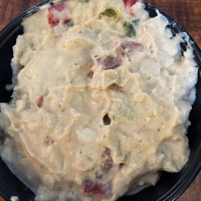Potato salad that doesn't come from a plastic tub in the supermarket. Those chunks of pimento and pickle are little flavor bombs in every bite.