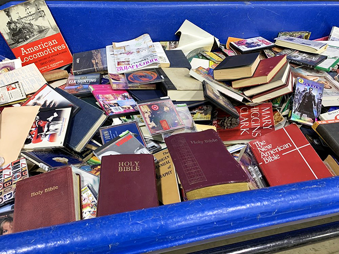Literary archaeology at its finest! These religious texts and vintage books represent decades of bedside reading, now awaiting new nightstands.