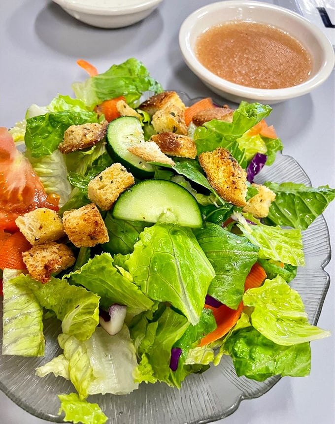 A salad that actually looks like it wants to be eaten, not just photographed. Those house-made croutons didn't come from a bag.