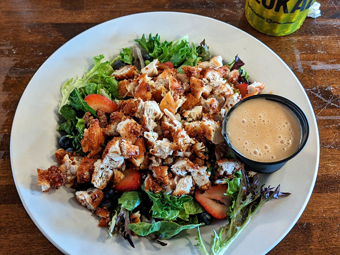 A salad that doesn't feel like punishment. Crispy chicken, fresh greens, and that dressing &ndash; proof that healthy-ish can still be utterly craveable.