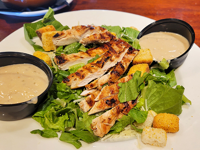 This isn't just a chicken Caesar salad; it's proof that sometimes the lighter option can be just as show-stopping as its heartier menu siblings.