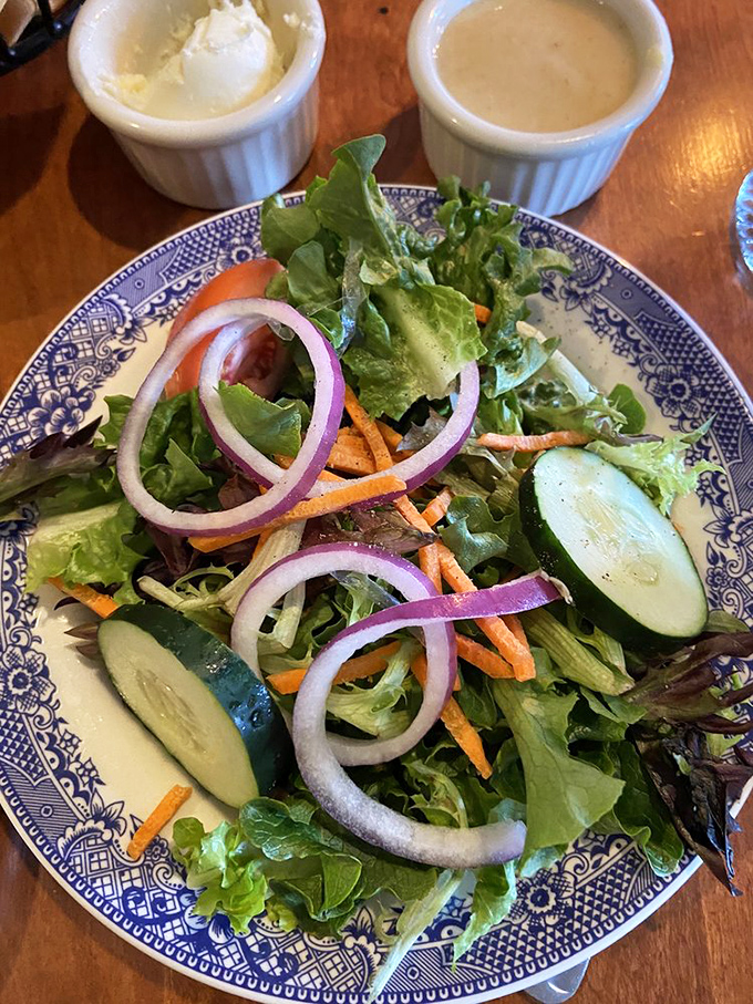 A garden-fresh salad that brings color and crunch to the table—proof that vegetables can hold their own even in a temple of meat.