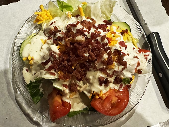 Salad gets serious with this loaded creation. Those bacon bits aren't just toppings&mdash;they're little flavor ambassadors inviting you to the party.