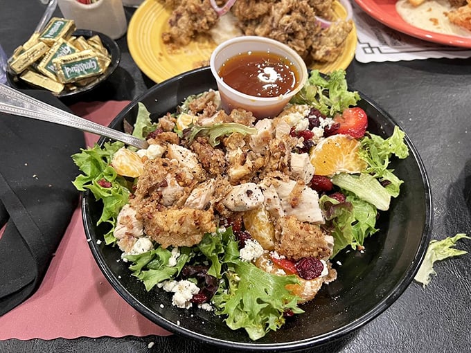 This isn't just a salad—it's a salad that understands its supporting role in a steakhouse. Crisp, colorful, and topped with enough protein to qualify as its own entrée.