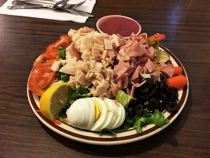 A chef's salad that proves vegetables can be exciting when properly dressed and introduced to the right protein companions.