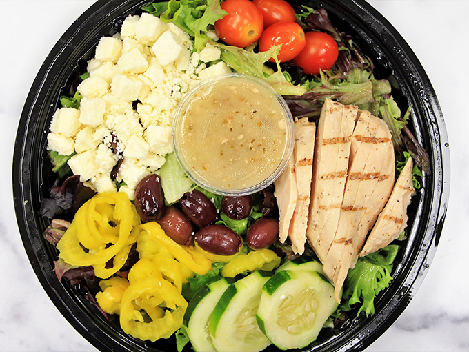 A salad that actually satisfies&mdash;grilled chicken, feta, olives and all the right Mediterranean players having a delicious party in a to-go container.