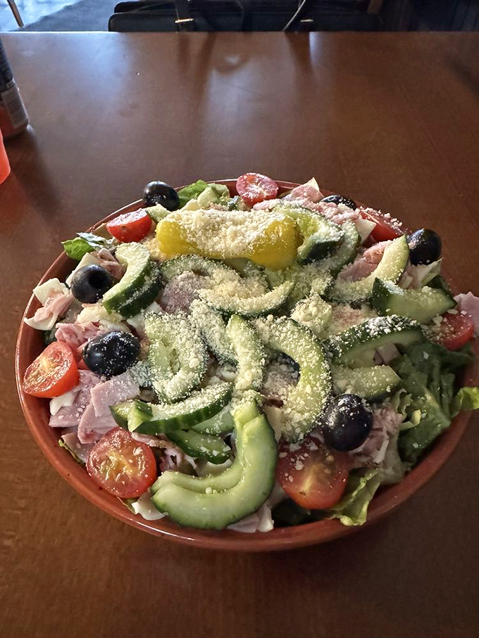 This isn't just a salad; it's a colorful Mediterranean vacation on a plate, with each ingredient playing its part in perfect harmony.