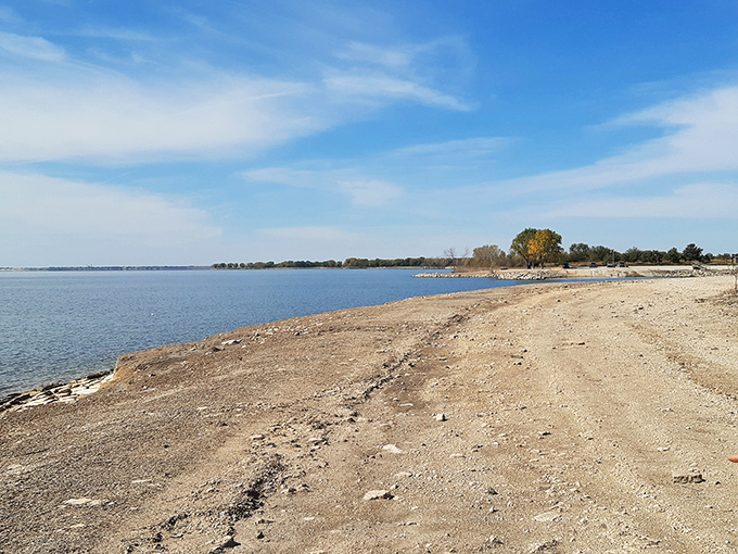 The shoreline stretches toward infinity, offering solitude seekers their own private slice of Kansas paradise.