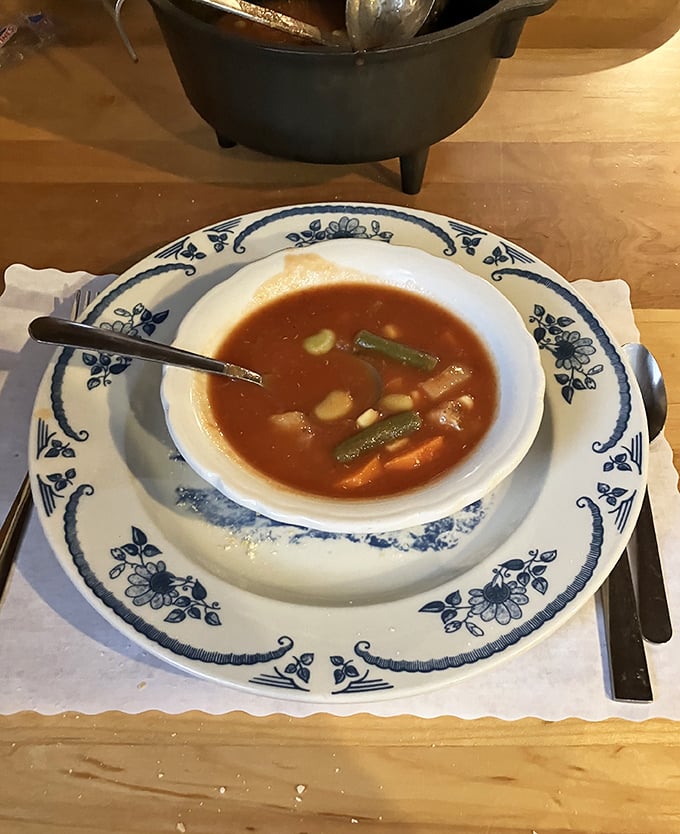 A bowl of vegetable soup that could heal whatever ails you, served on china that's seen more family celebrations than a birthday cake.