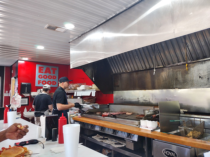 The unsung heroes behind Johnny's enduring legacy. These skilled burger artisans have perfected their craft through years of dedicated service to hungry patrons.