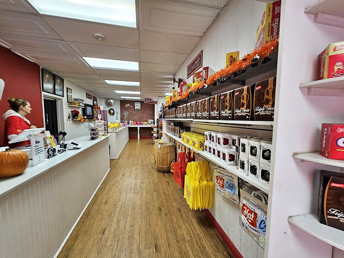 The friendly staff stands ready to enable your sweetest impulses, offering guidance through Boyer's sugary landscape with expert precision.