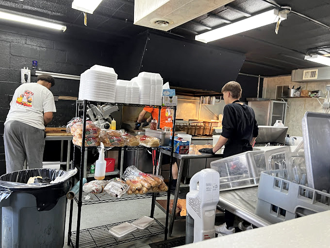 Behind the scenes where the magic happens. No wizards, just dedicated folks who understand the ancient art of transforming meat with smoke and time.