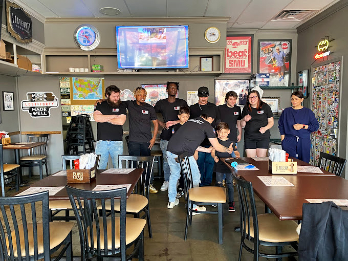 The dining room buzzes with the satisfied murmur of locals who know they've found their spot—the kind where everybody eventually knows your name.