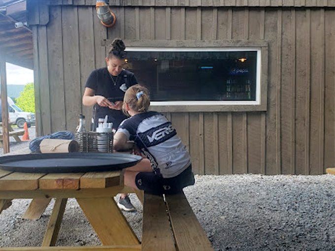 Where the magic happens &ndash; dedicated staff serving up smoky treasures to hungry pilgrims who've made the barbecue journey.