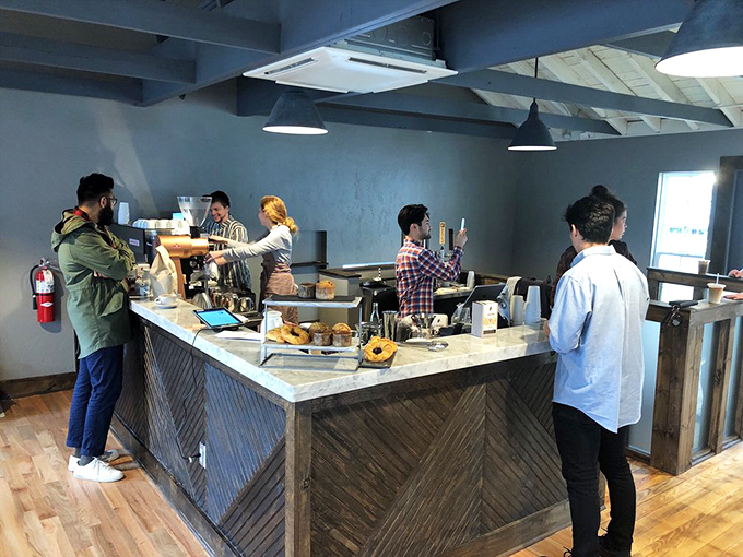 Behind the counter is where the magic happens&mdash;skilled baristas transforming simple beans into the liquid gold that keeps customers coming back. 