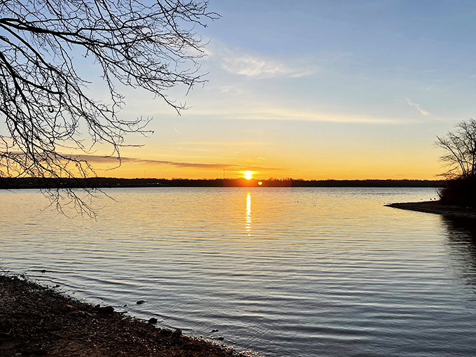 Nature's farewell performance. An Alum Creek sunset paints the water with golden brushstrokes, creating a masterpiece that changes every evening.