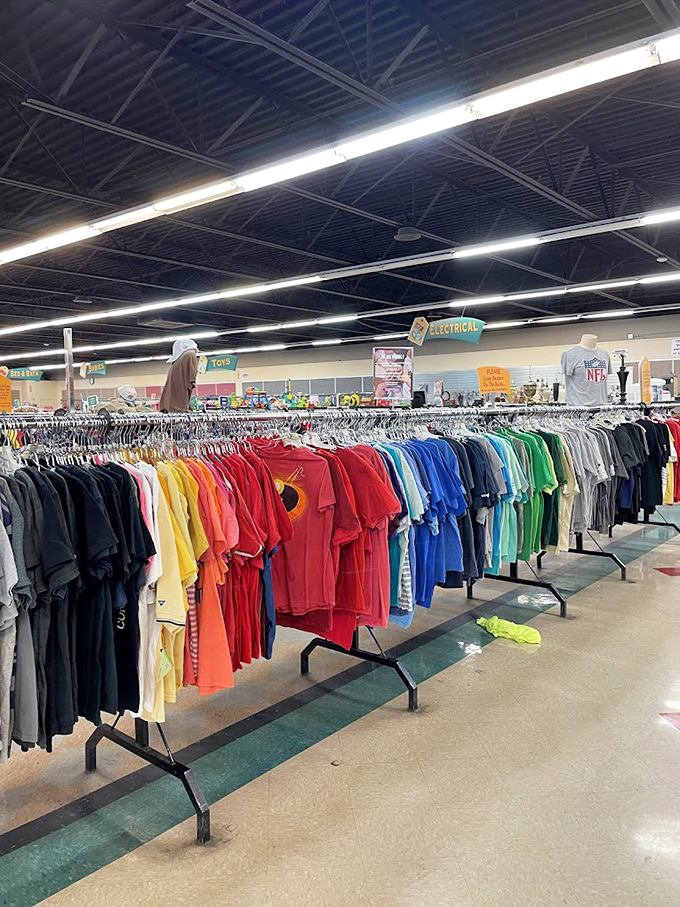 T-shirts arranged in a rainbow gradient create an Instagram-worthy display that's equal parts art installation and bargain opportunity.