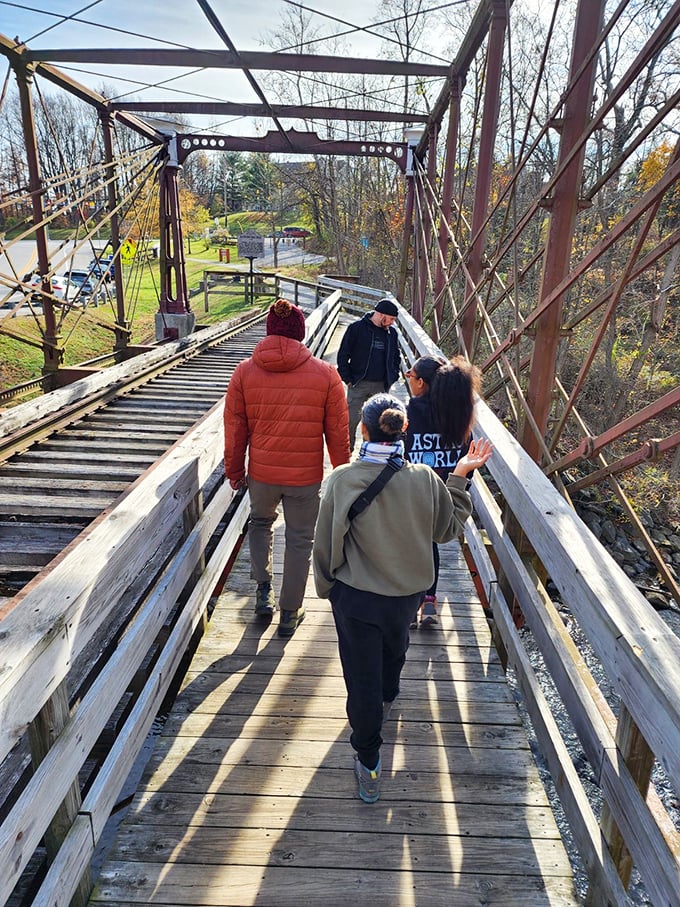 Crossing history together&mdash;families making memories on a bridge that's seen generations come and go. Some connections are more than just steel and wood.
