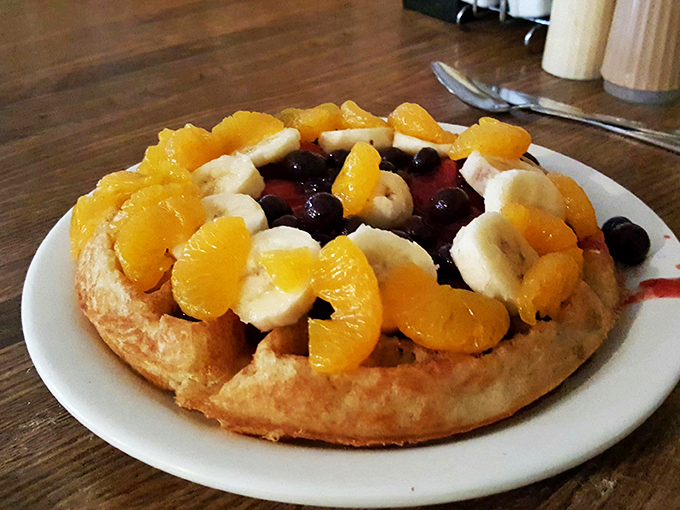 A waffle that's not just a breakfast &ndash; it's a fruit-topped pedestal celebrating the holy trinity of bananas, berries, and citrus.