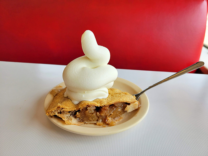 This isn't just apple pie &ndash; it's the final chapter in a love letter to American comfort food, topped with a cloud of whipped cream.