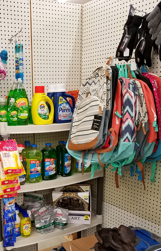 Cleaning supplies and backpacks share space in this practical corner. Even everyday necessities get their moment in the spotlight at Emporium 1101.