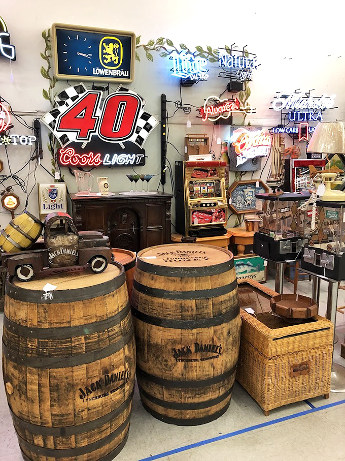 Jack Daniel's barrels and neon beer signs create a man-cave paradise that would make any garage-dweller weep with joy.