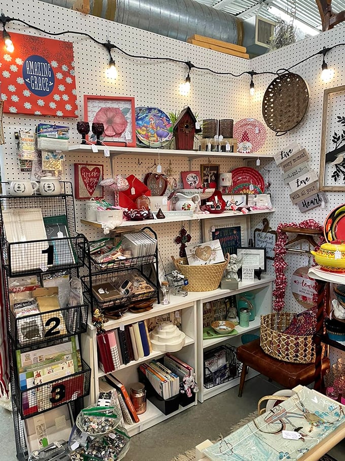 String lights illuminate treasures with a warm glow in this booth that perfectly balances vintage charm with modern sensibility. Someone's curated their heart out here!
