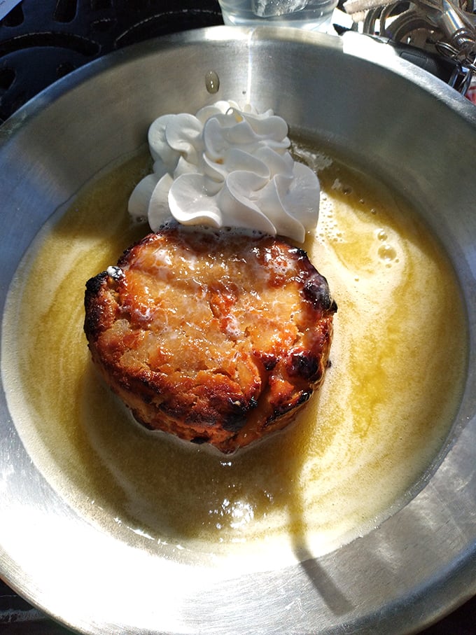 This bread pudding swimming in bourbon sauce isn't dessert&mdash;it's the edible equivalent of a standing ovation.