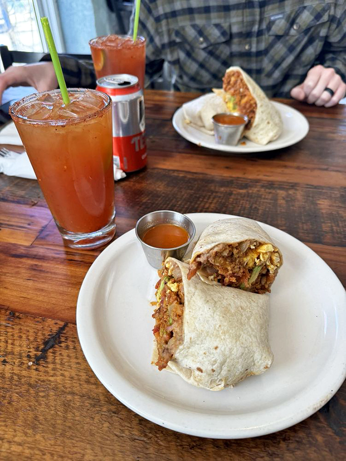 Breakfast wrapped in a warm tortilla embrace. This burrito promises to cure whatever ailed you from the night before.