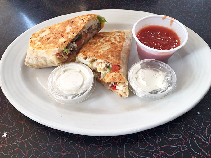 The breakfast burrito &ndash; civilization's greatest achievement since indoor plumbing, served with salsa that kicks like a morning alarm clock.